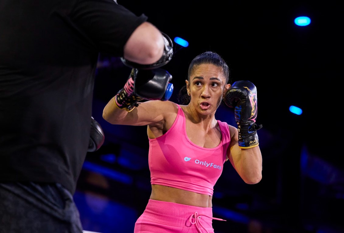 Photographs of Amanda Serrano training in open workout